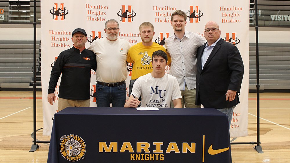 Lacey signs to wrestle at Marian University