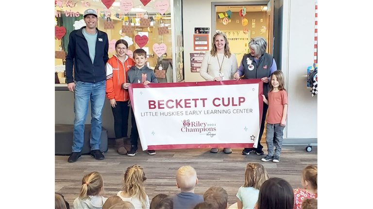 Little Husky Beckett Culp celebrated as a Riley Champion